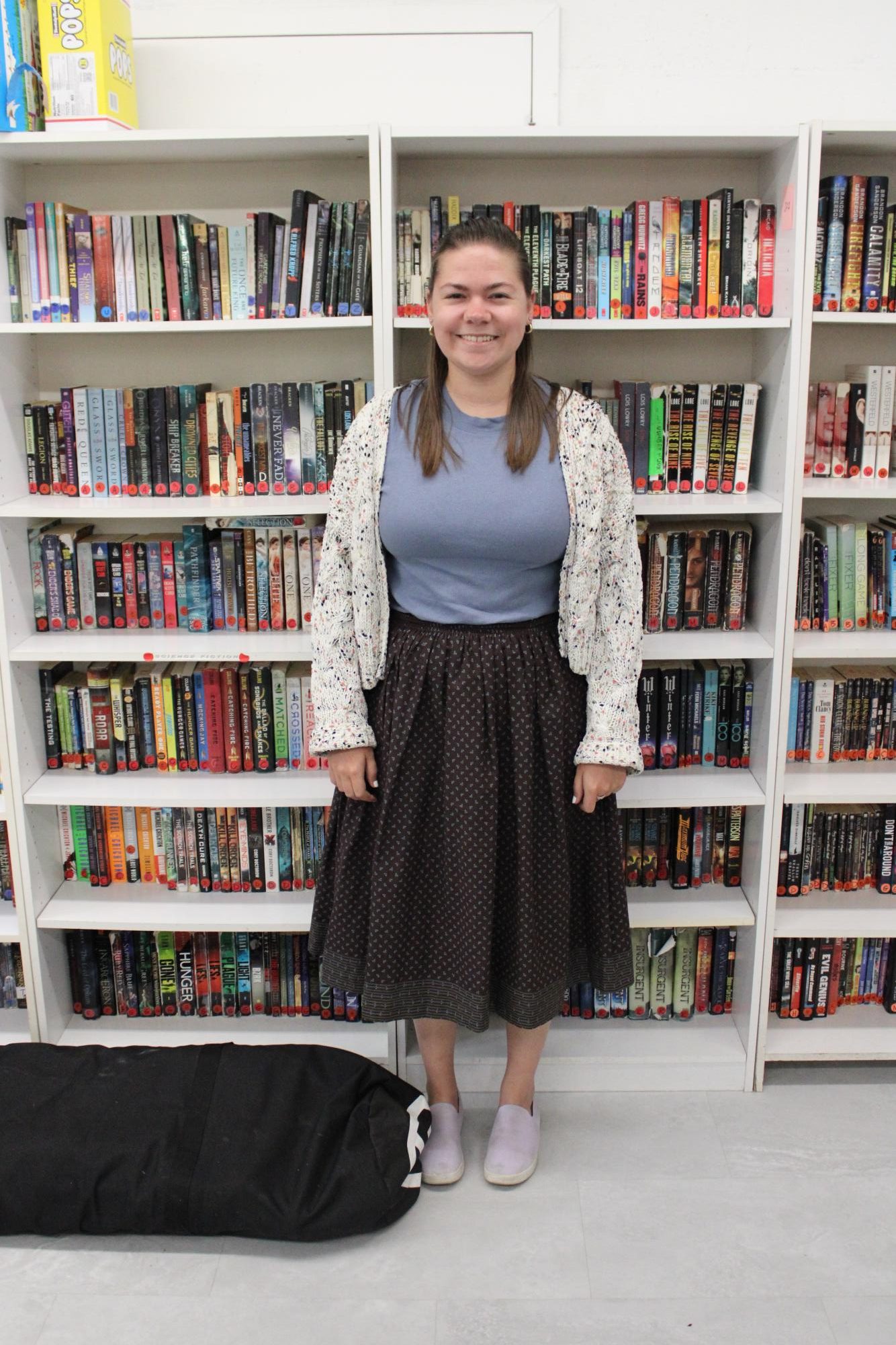 Staff Spotlight: Ms. Christina Woelk – The Emerald Press